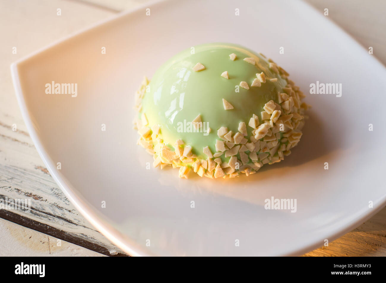 Green dessert with icing Stock Photo - Alamy