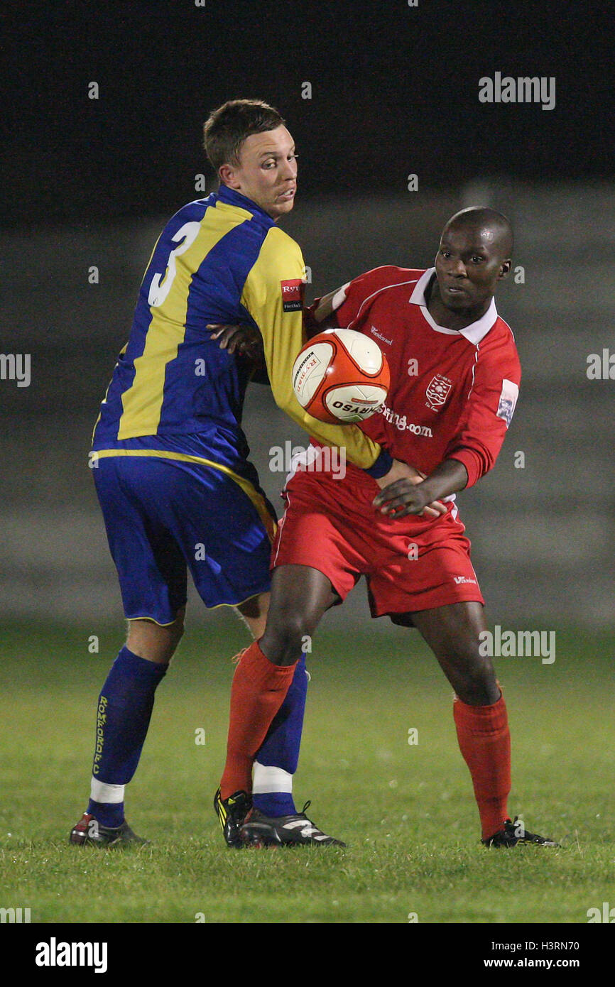 Paul Kavanagh of Romford tangles with C Roberts of Ilford - Romford vs ...