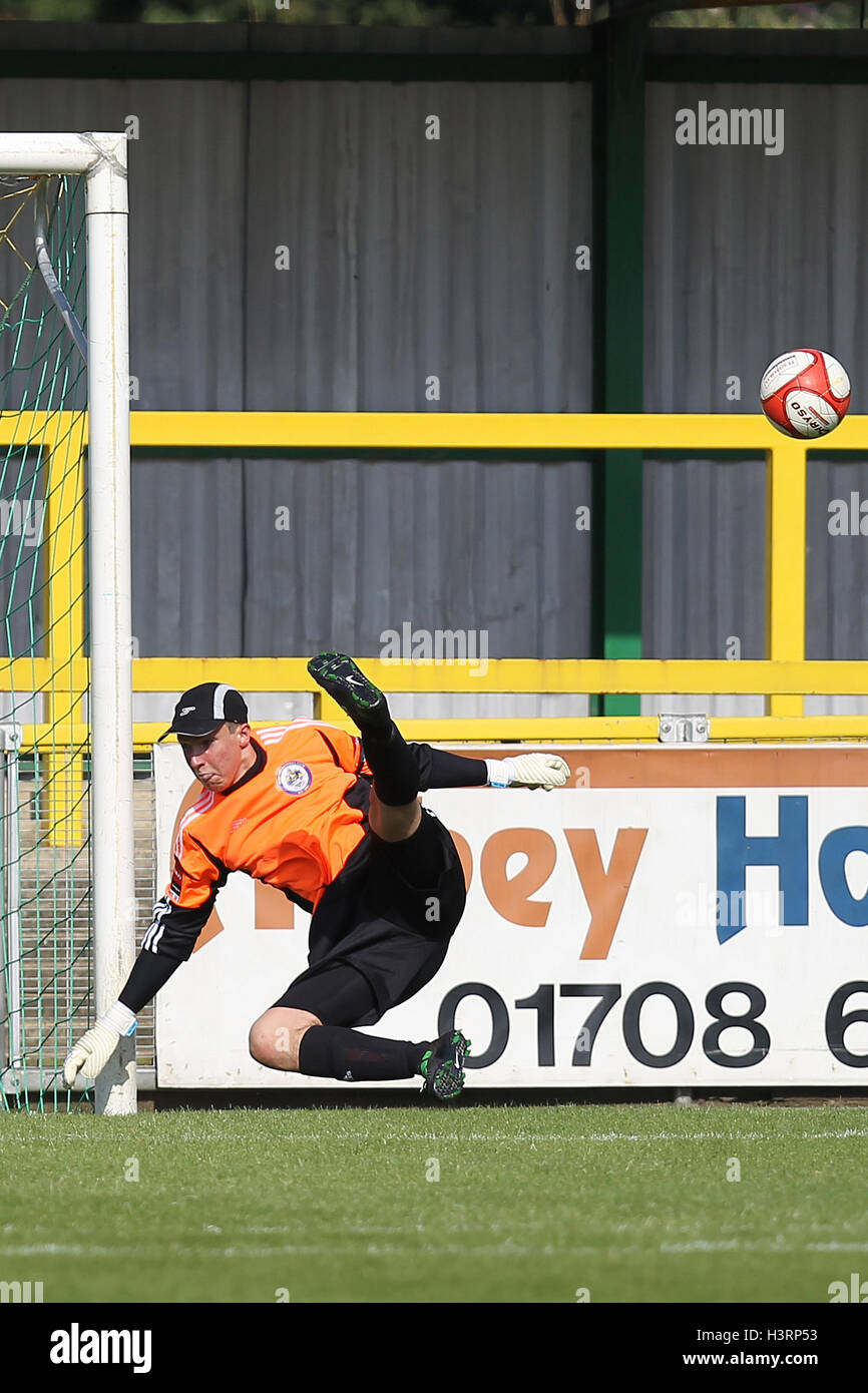Michael Gooch of Romford makes a fine save to deny Redbridge a long ...