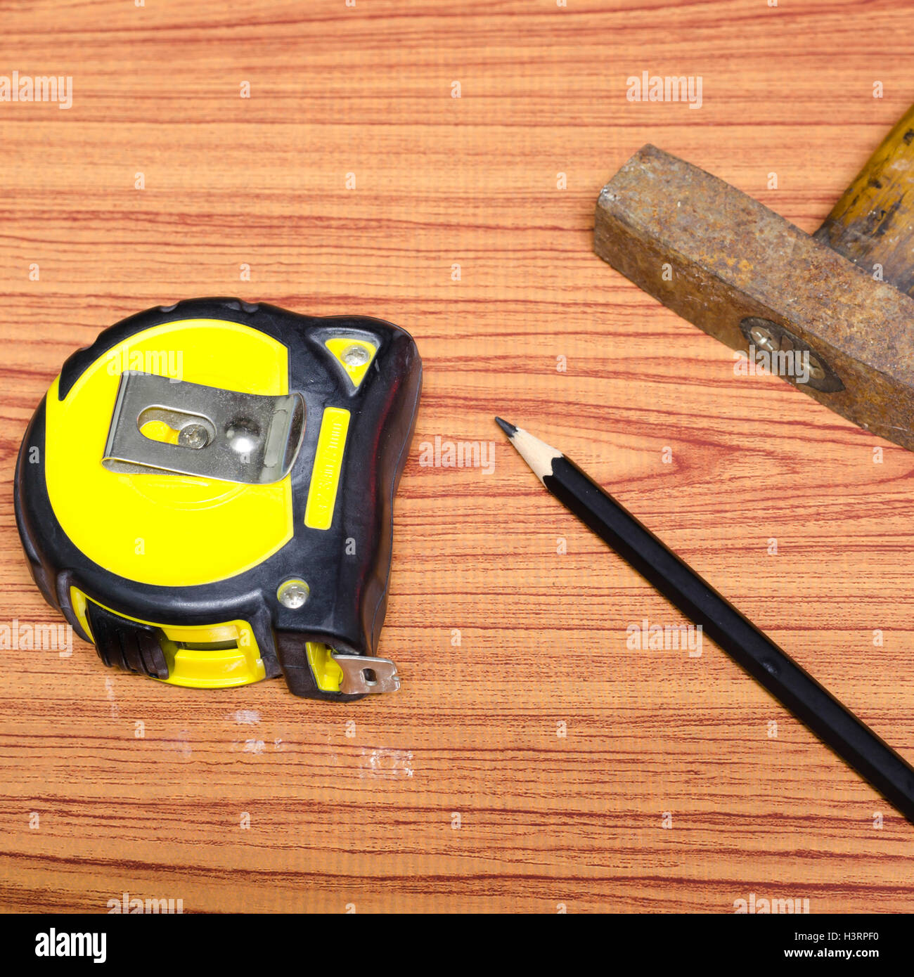 hammer measuring tape and pencil Stock Photo - Alamy