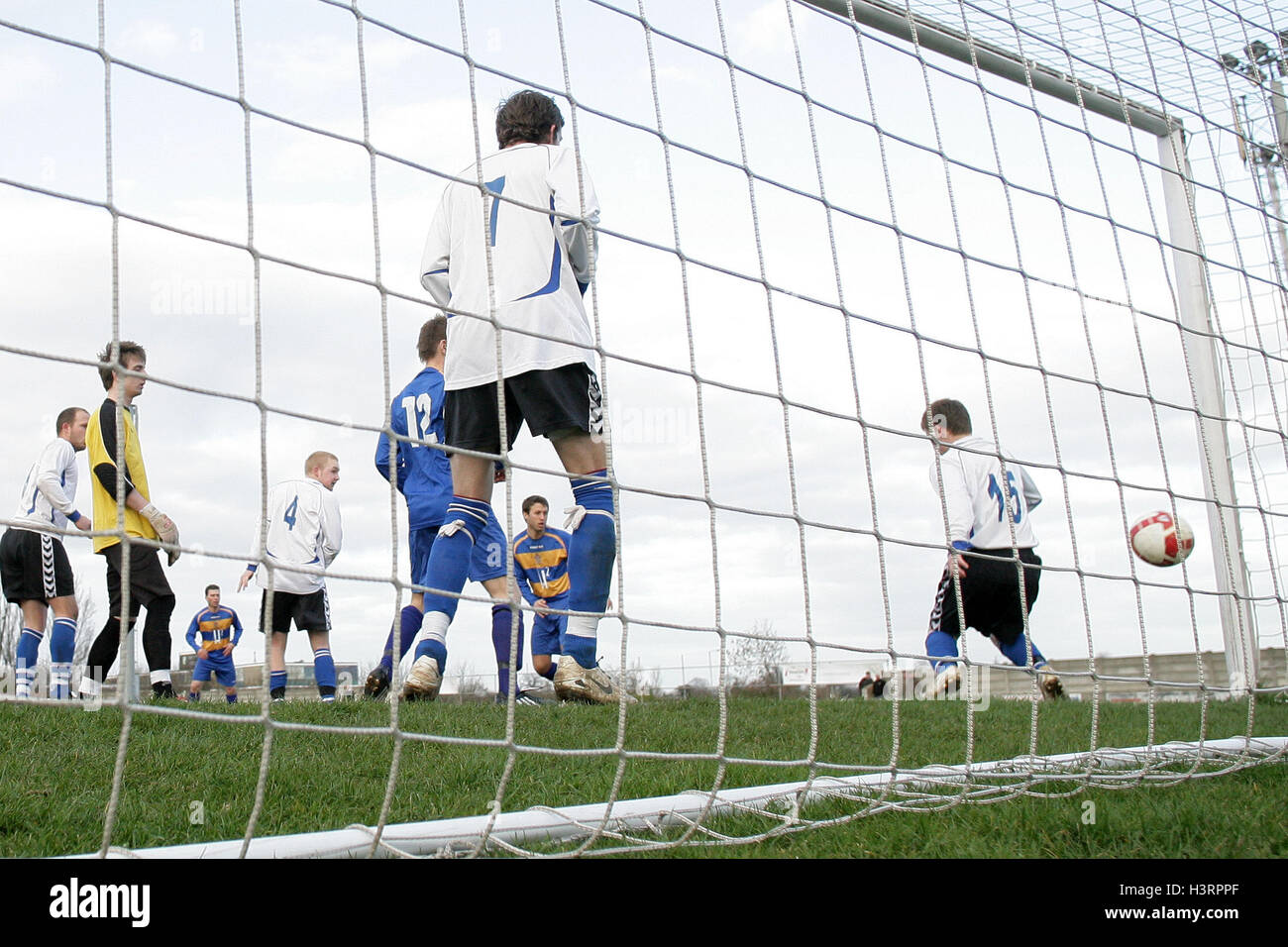 Ben Turner (visible between legs of player 7) scores the third goal for ...