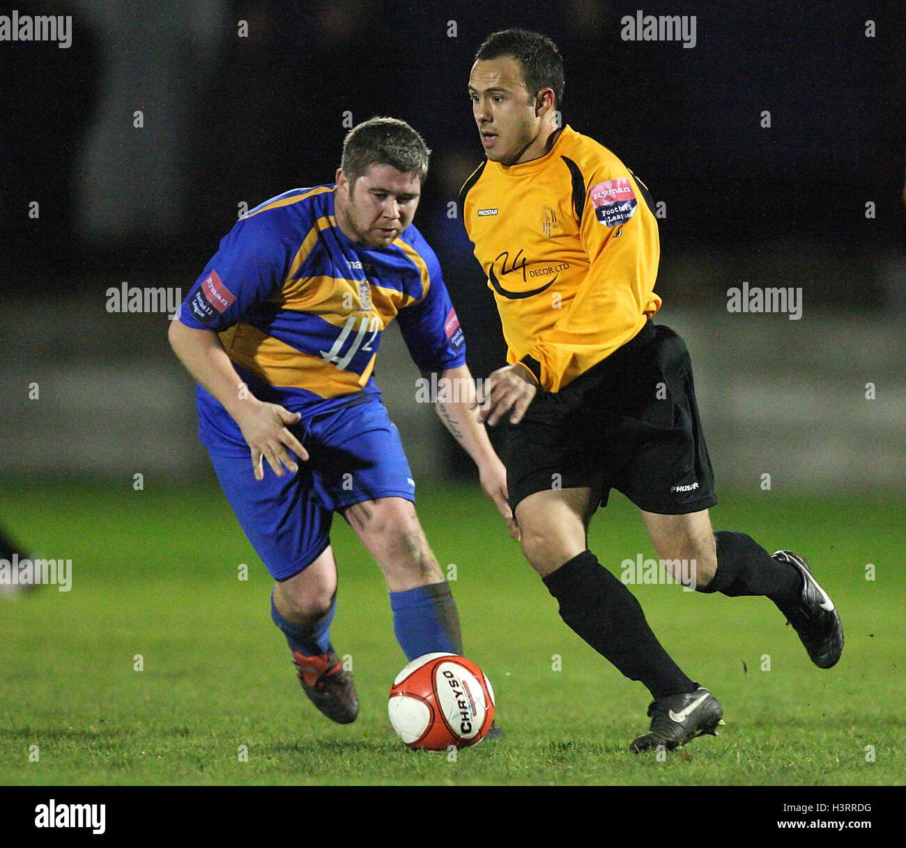 Michael Sharman of Ware brings the ball away from James Gammons of ...
