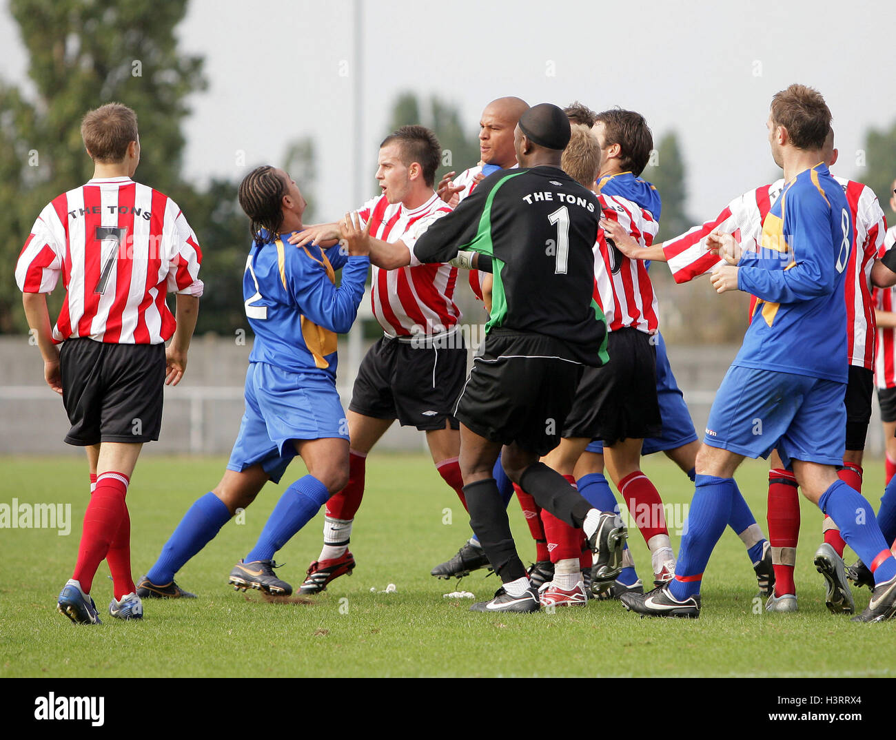 Danny Downer (2nd left) is the centre of attention as a second-half ...