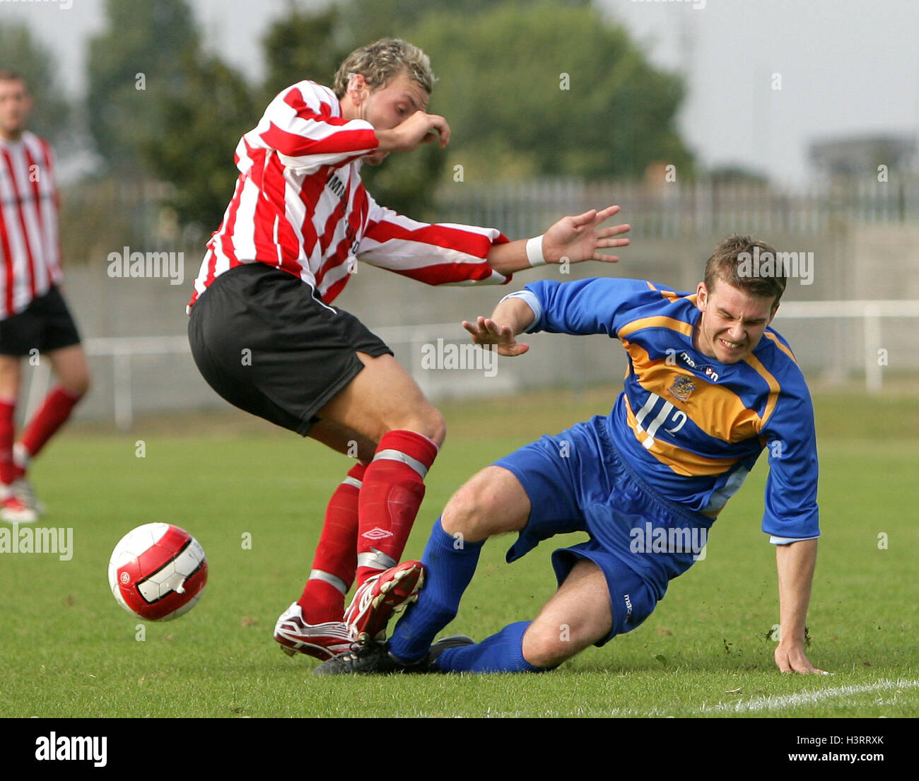 Richard Oxby of Romford (right) clashes with Harry Chalk of Clapton to ...