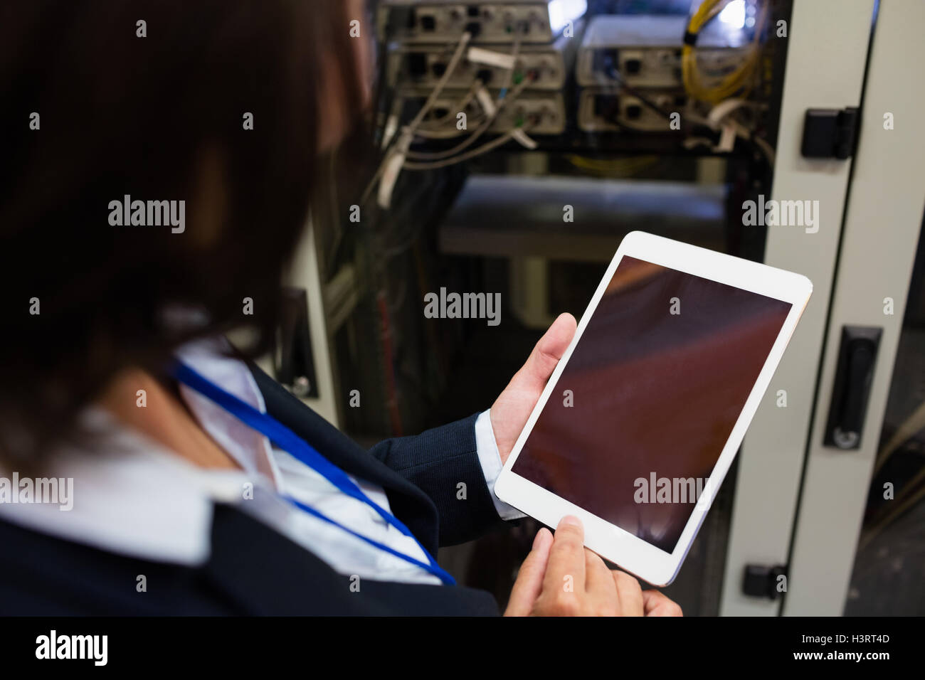 Technician using digital tablet Stock Photo - Alamy