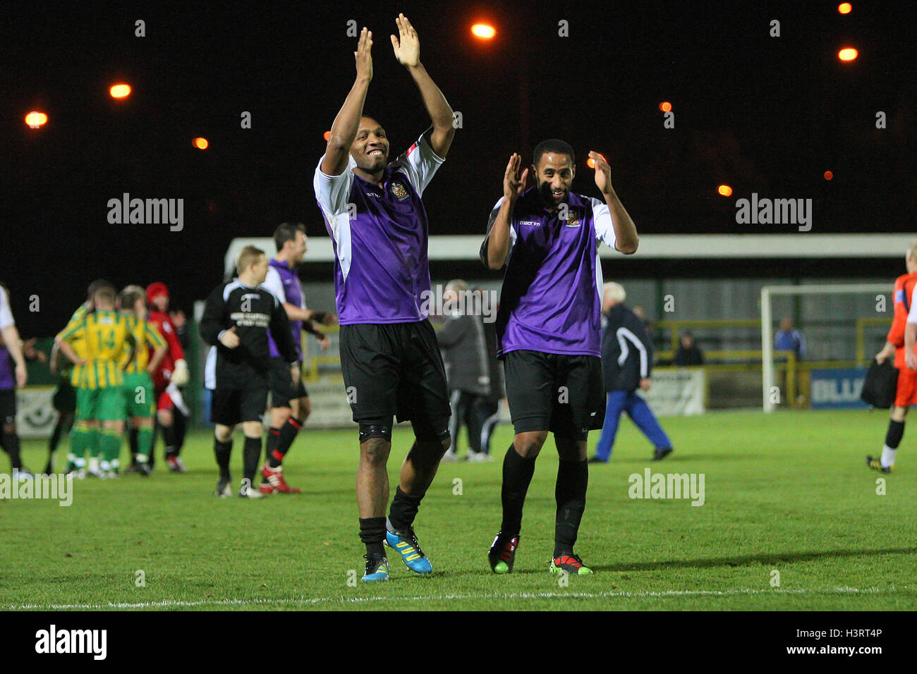 Rickie Hayles (L) and Michael Spencer clap the Hornchurch fans at the ...