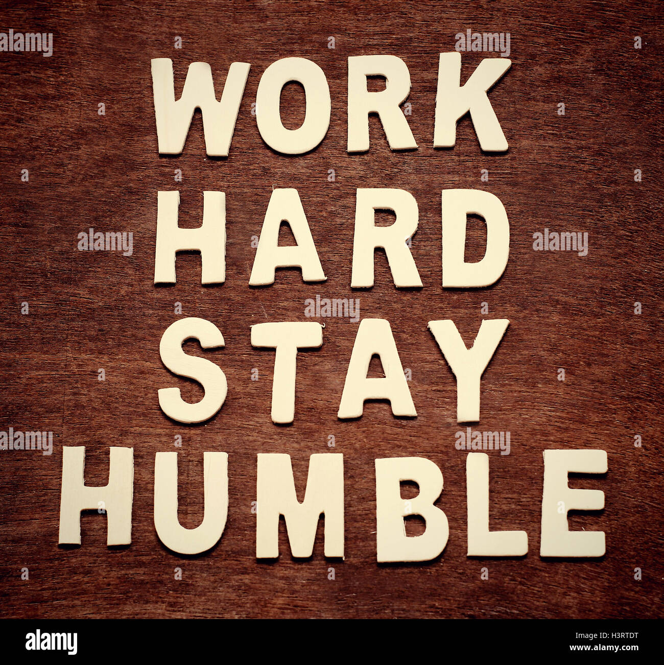 Inspirational motivating quote in wooden letters Stock Photo - Alamy