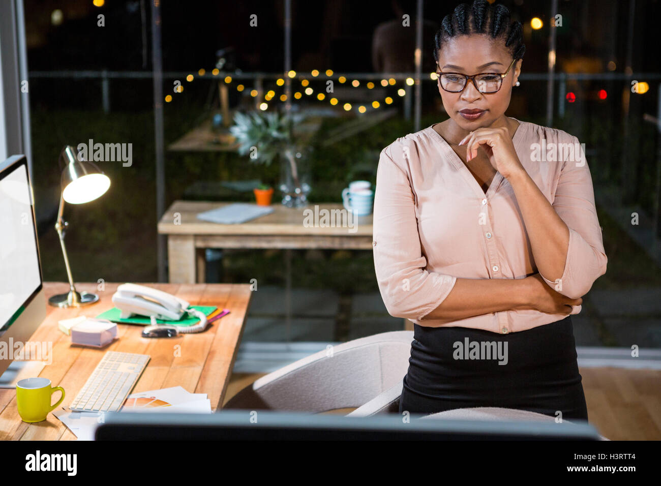 Thinking entrepreneur looking computer screen hi-res stock photography ...