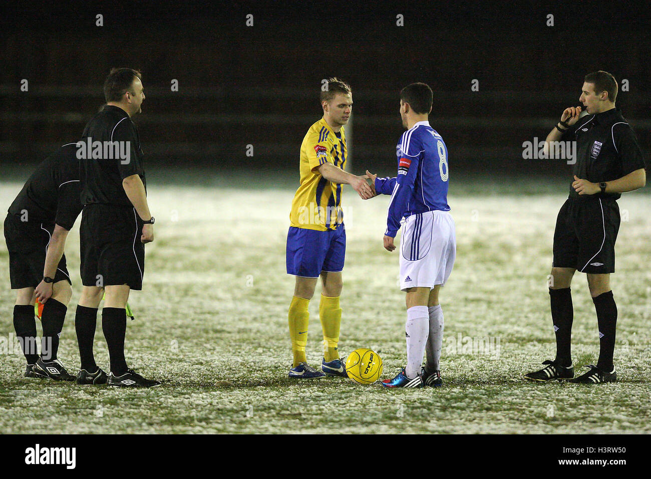 Romford captian Jack Barry shakes hands with his Wroxham counterpart ...