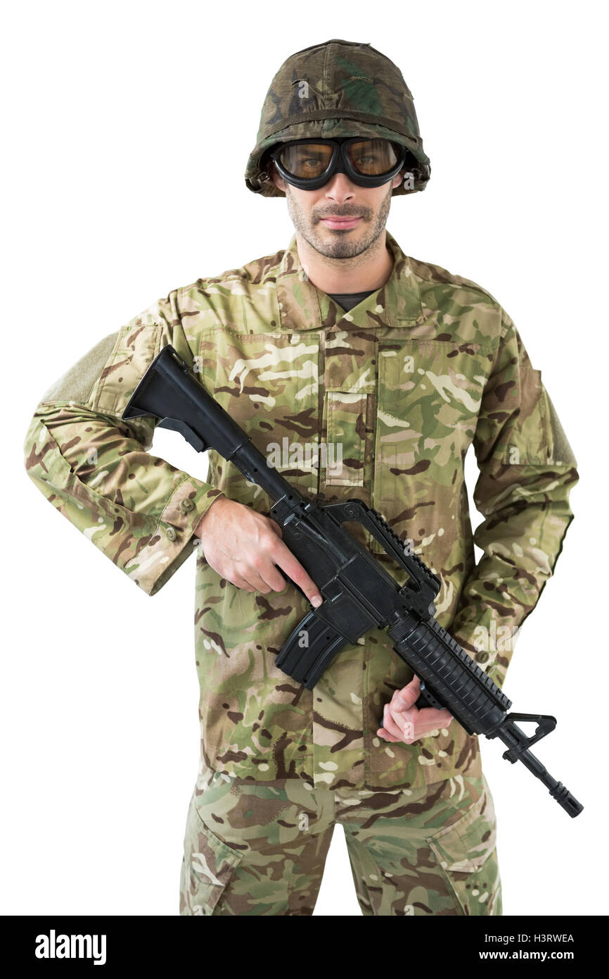 Portrait of soldier holding a rifle Stock Photo - Alamy