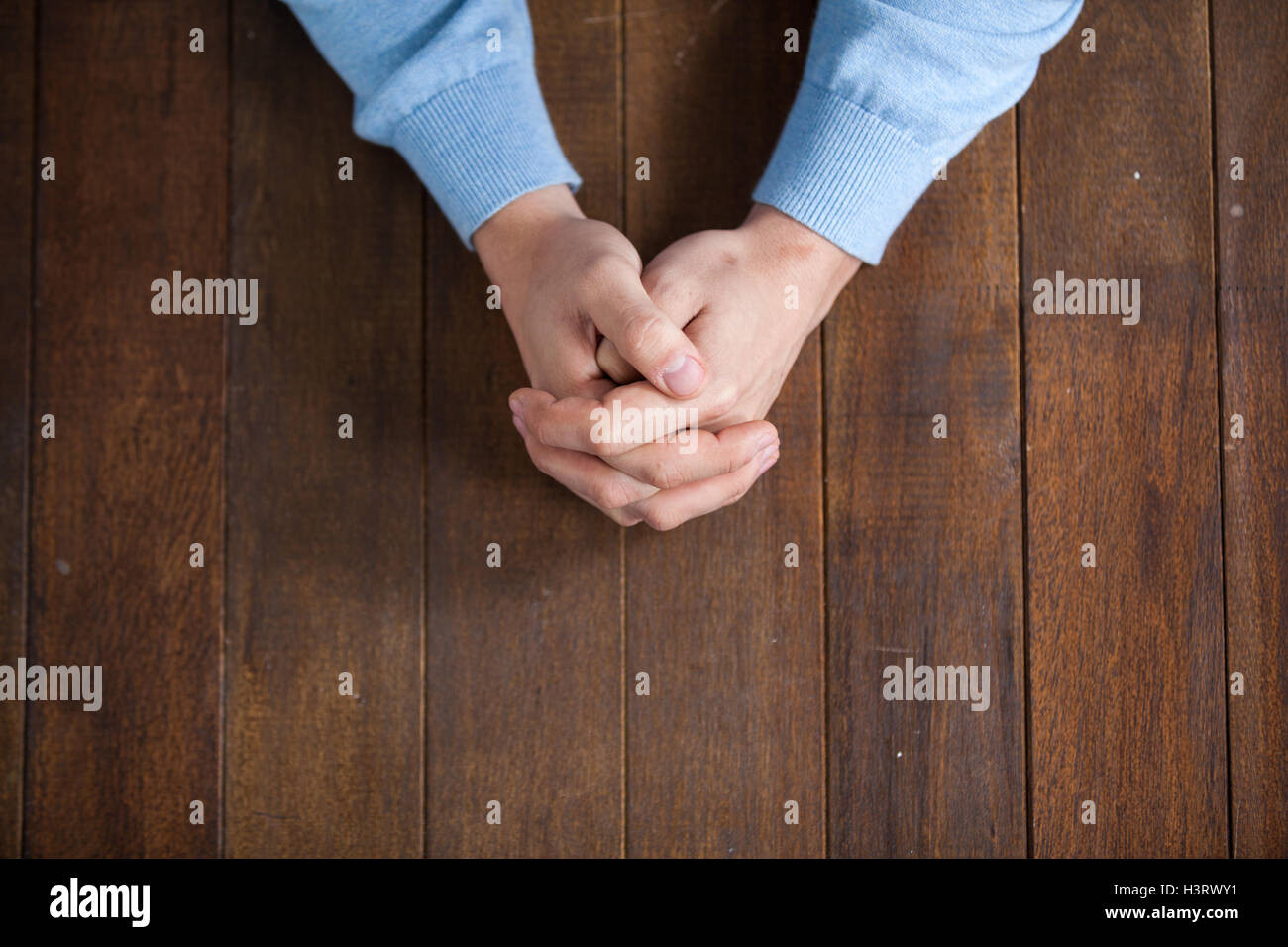 Praying hands of man Stock Photo - Alamy