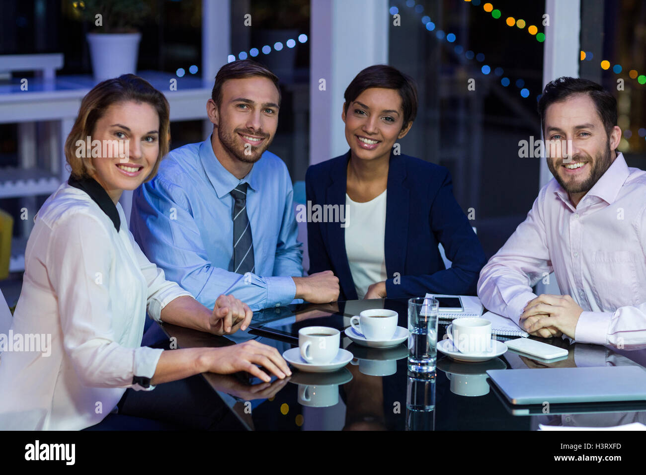 Businesspeople taking tea break Stock Photo - Alamy