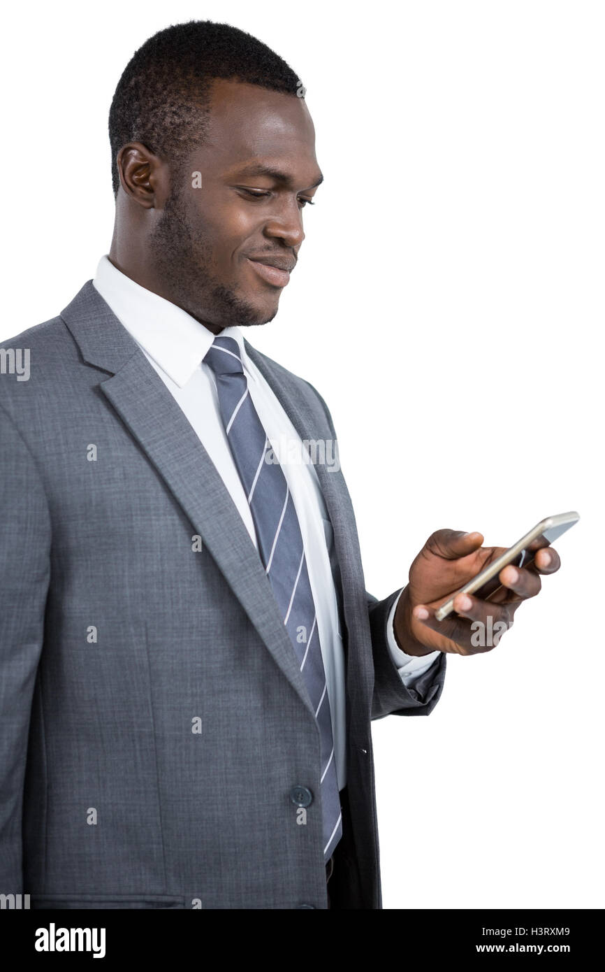 Businessman using his mobile phone Stock Photo - Alamy