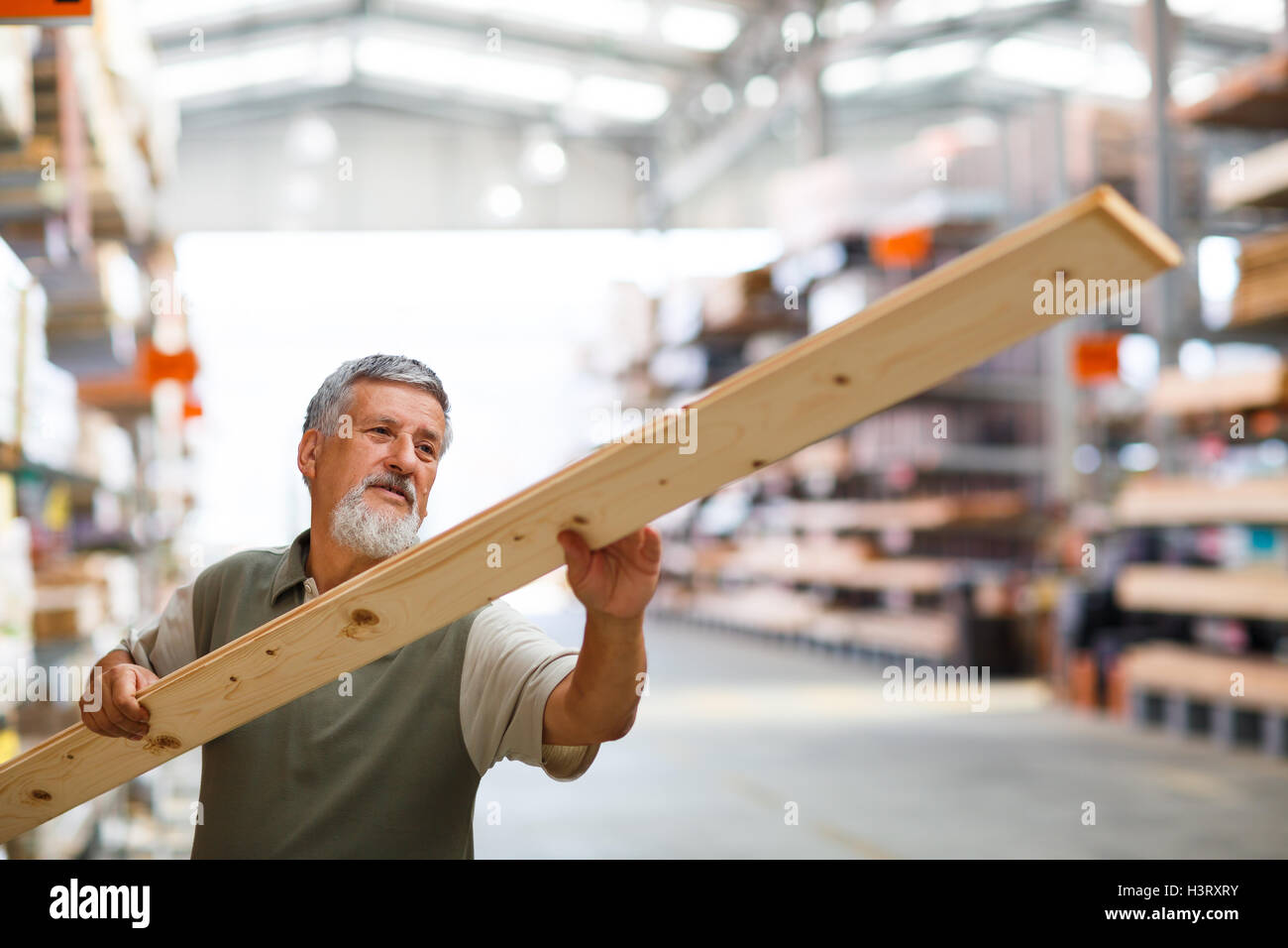Man buying construction wood in a DIY store Stock Photo - Alamy