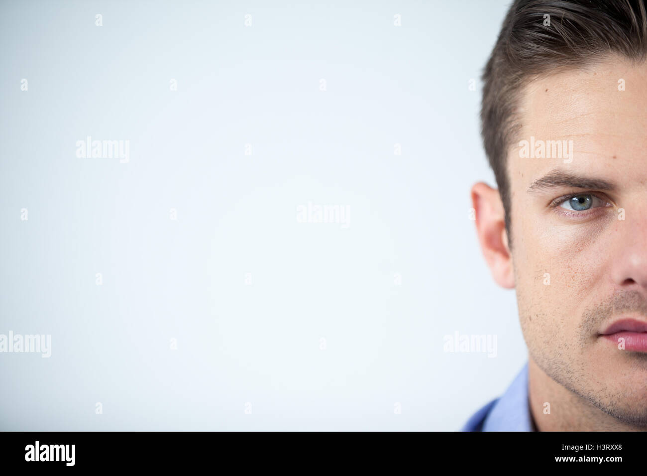Man wearing contact lens Stock Photo - Alamy