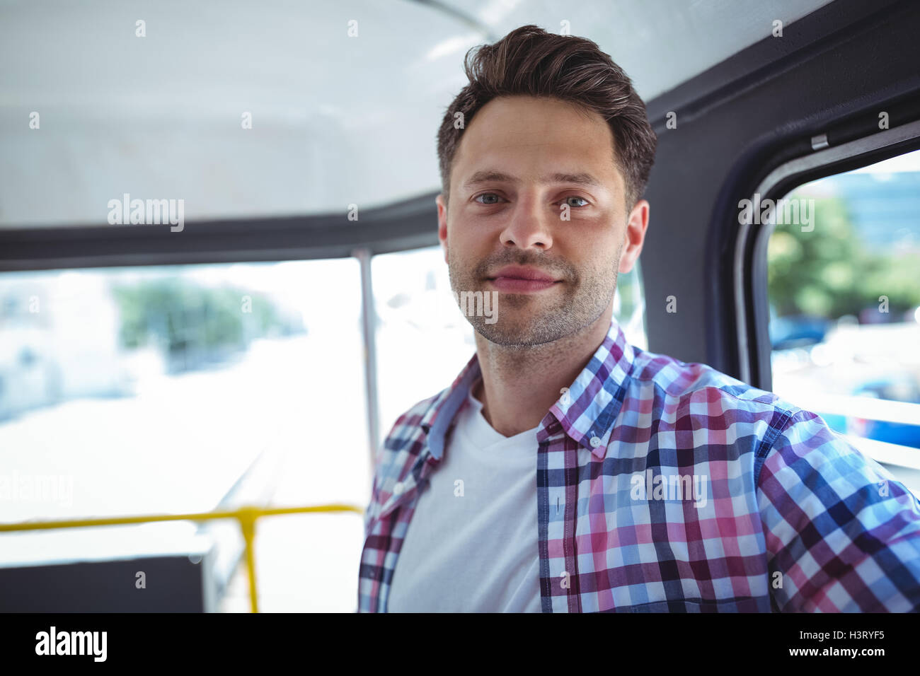 Portrait of man traveling in bus Stock Photo - Alamy