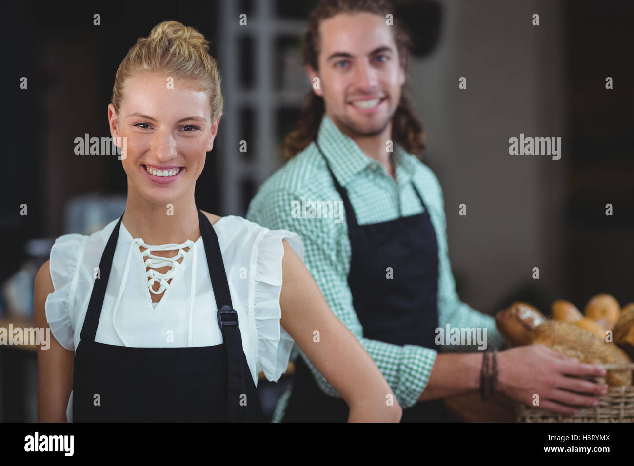Teamwork behind counter hi-res stock photography and images - Alamy