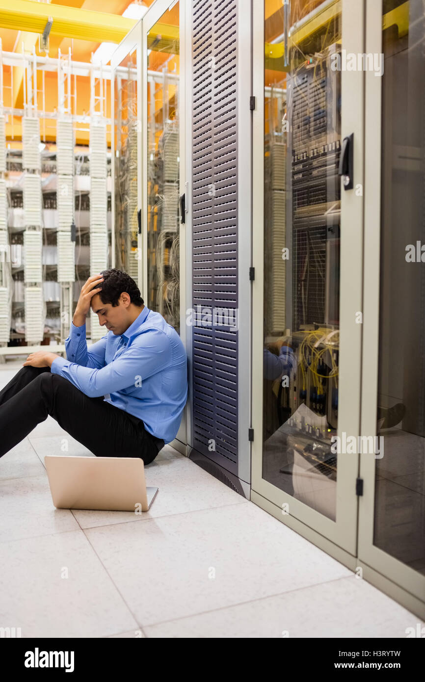 Stressed technician in data center hi-res stock photography and images ...