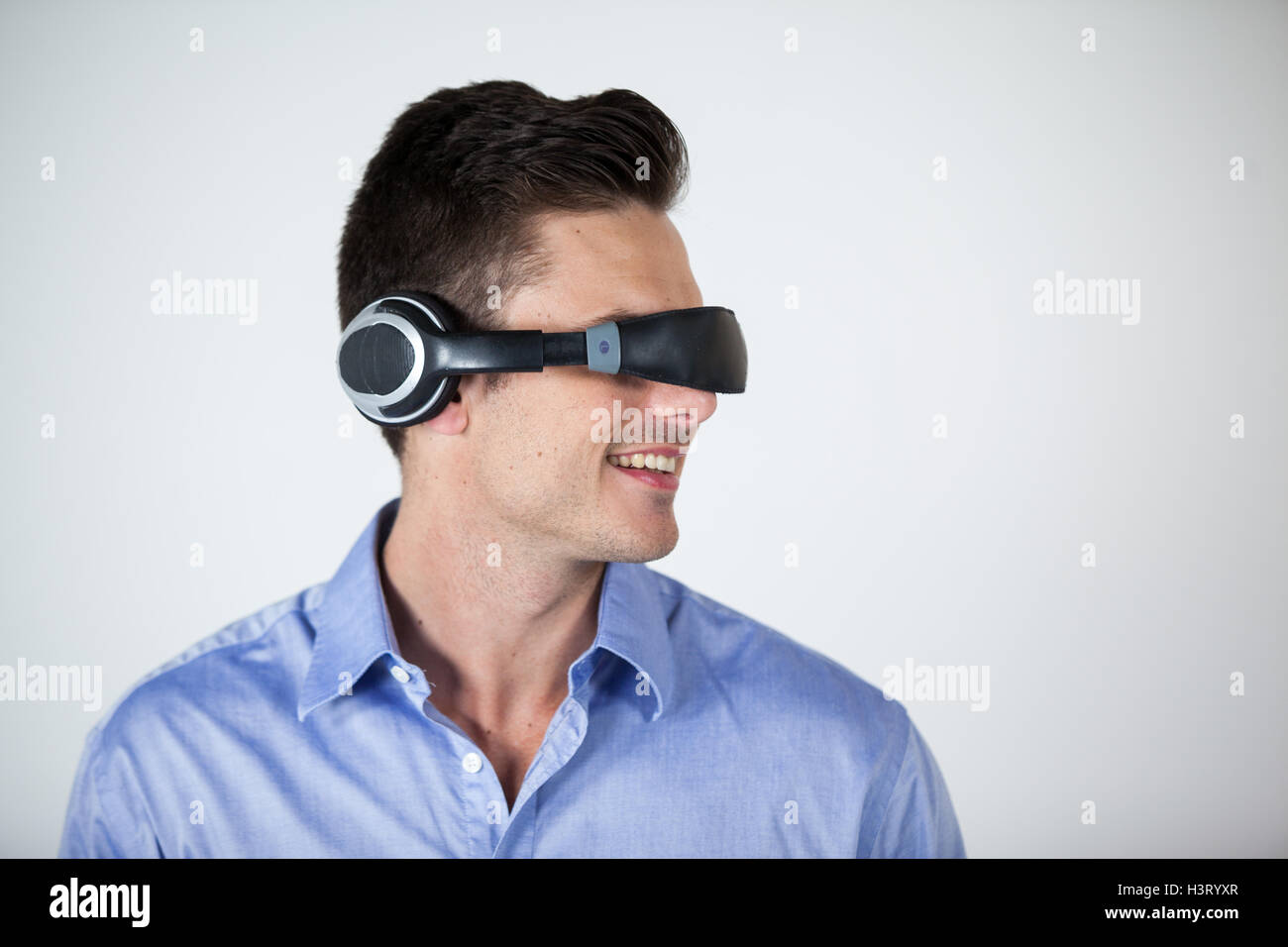 Man using virtual video glasses Stock Photo - Alamy