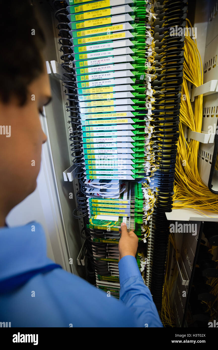 Technician checking routers Stock Photo - Alamy