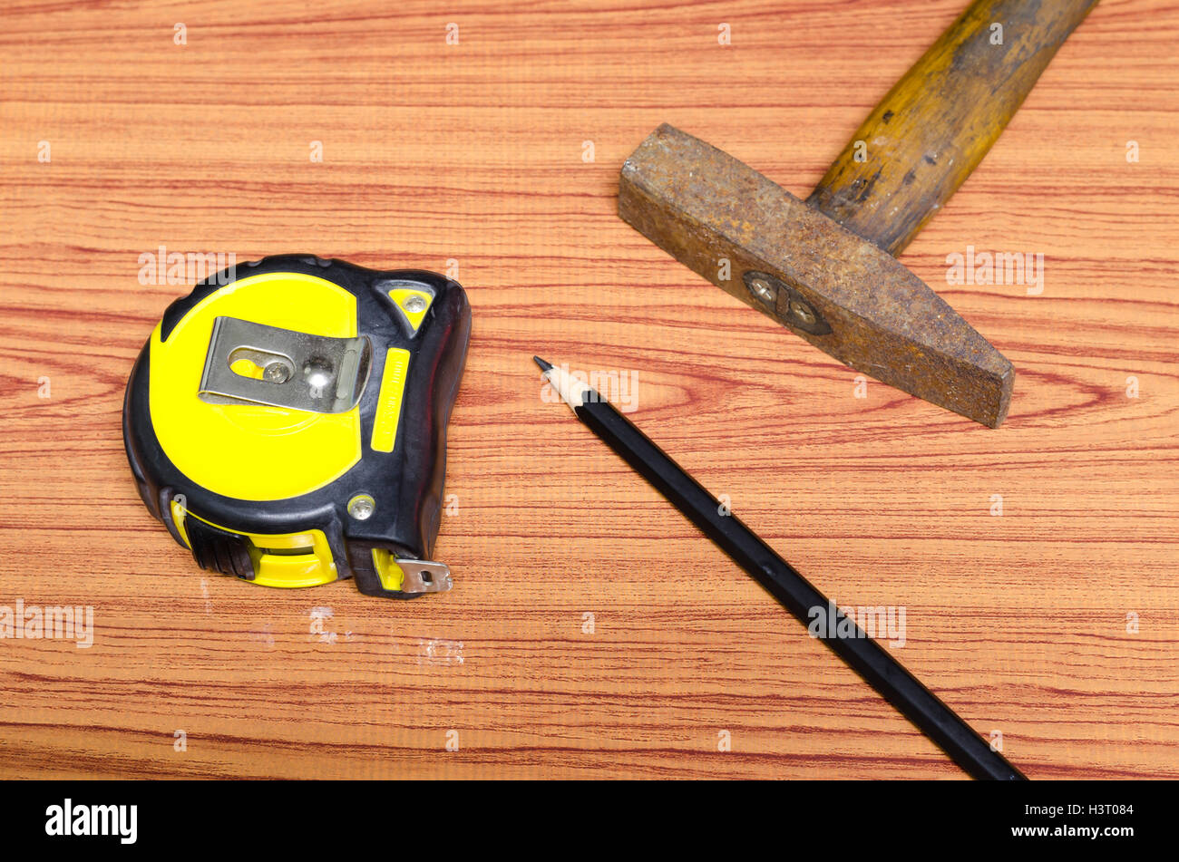 hammer measuring tape and pencil Stock Photo - Alamy