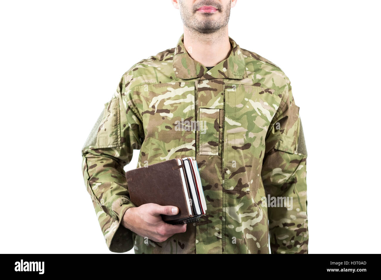 Soldier holding book hi-res stock photography and images - Alamy