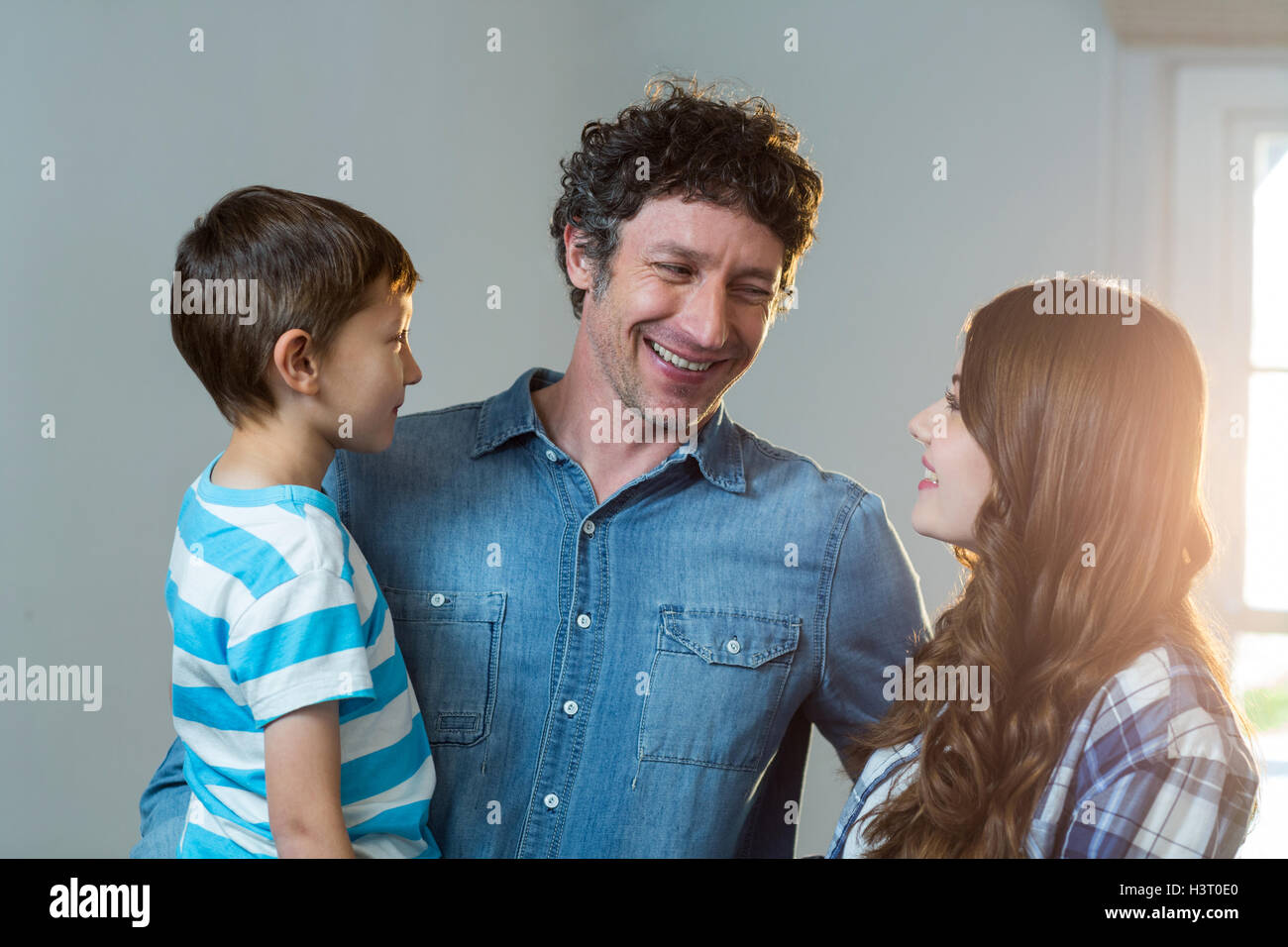 Family interacting with each other Stock Photo - Alamy