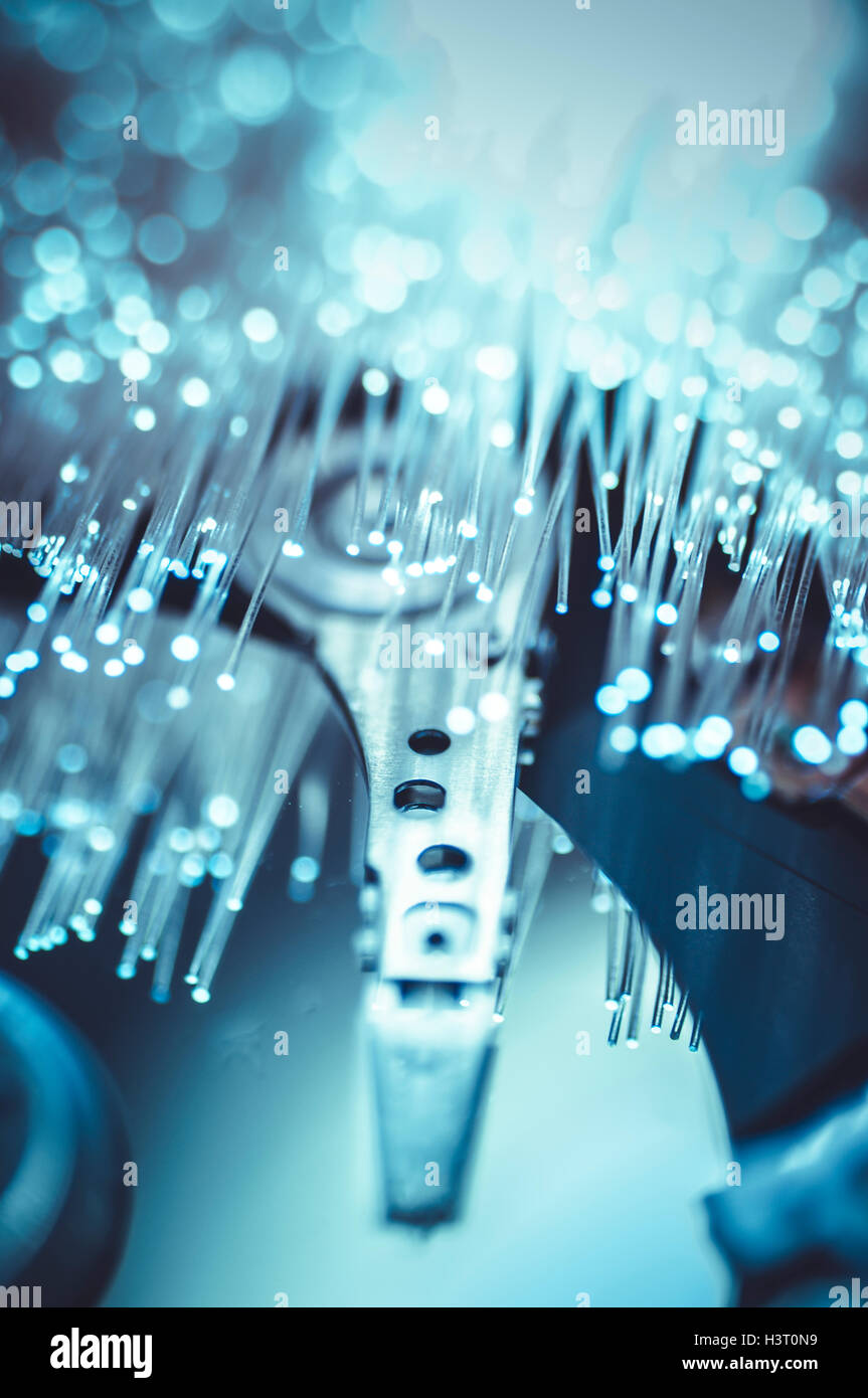 electronics, mechanism inside hard disk with fiber optic lights Stock ...