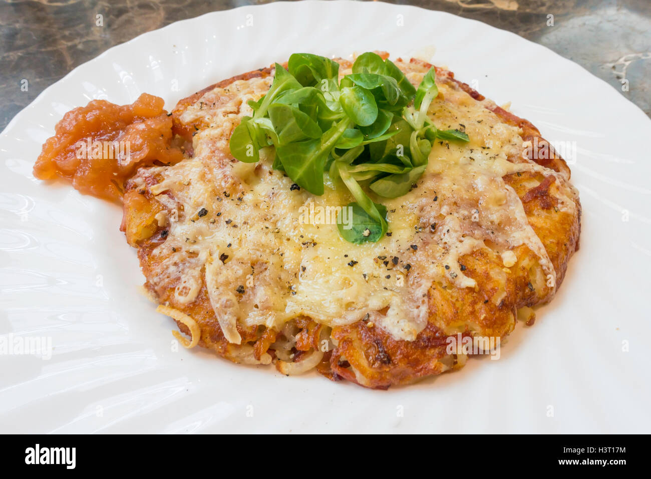 Lunch in a café Bacon and Raclette Rosti grated potatoes Gruyere Cream ...
