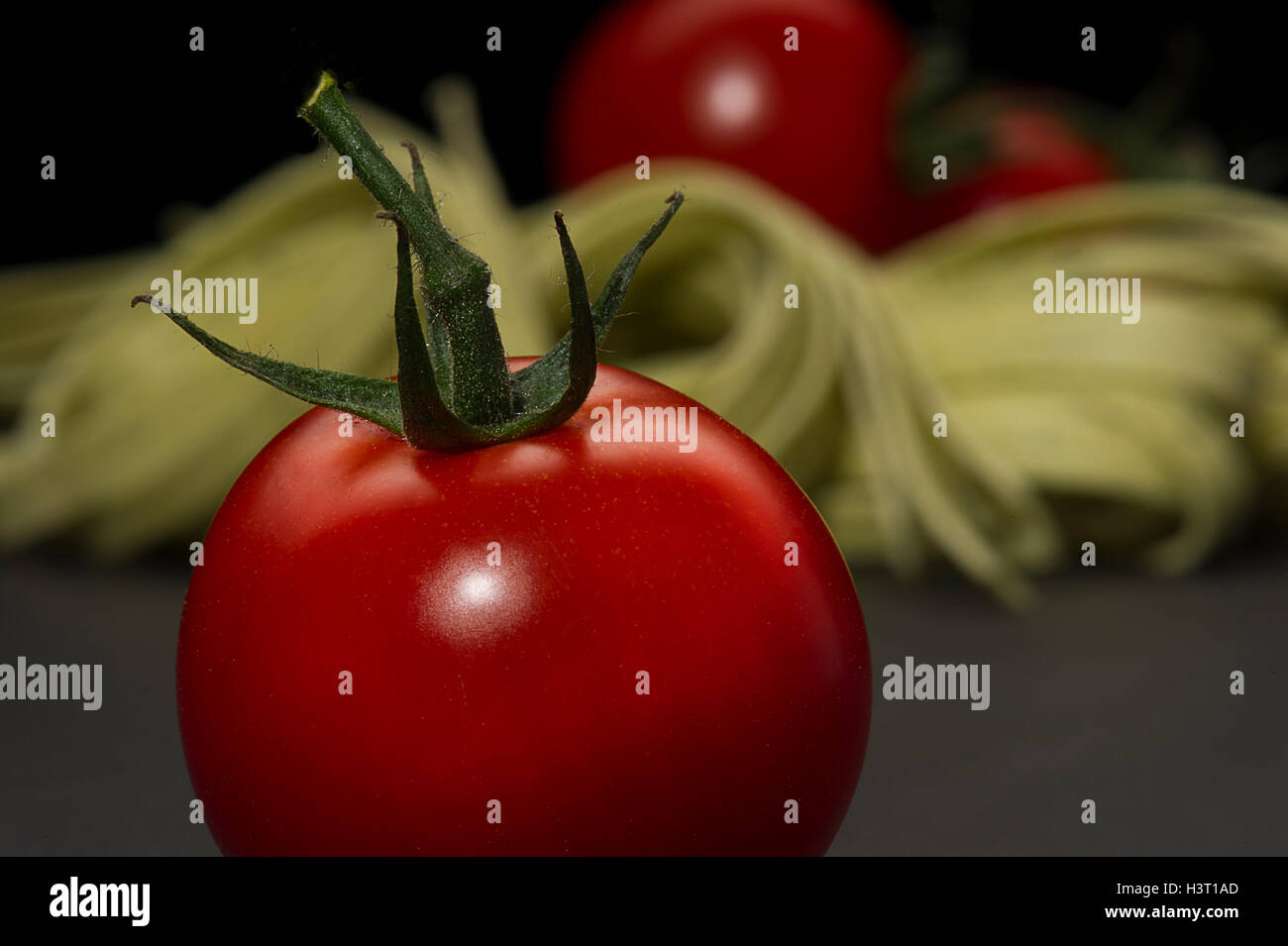 Ripe farm fresh tomato for cooking in pasta Stock Photo - Alamy