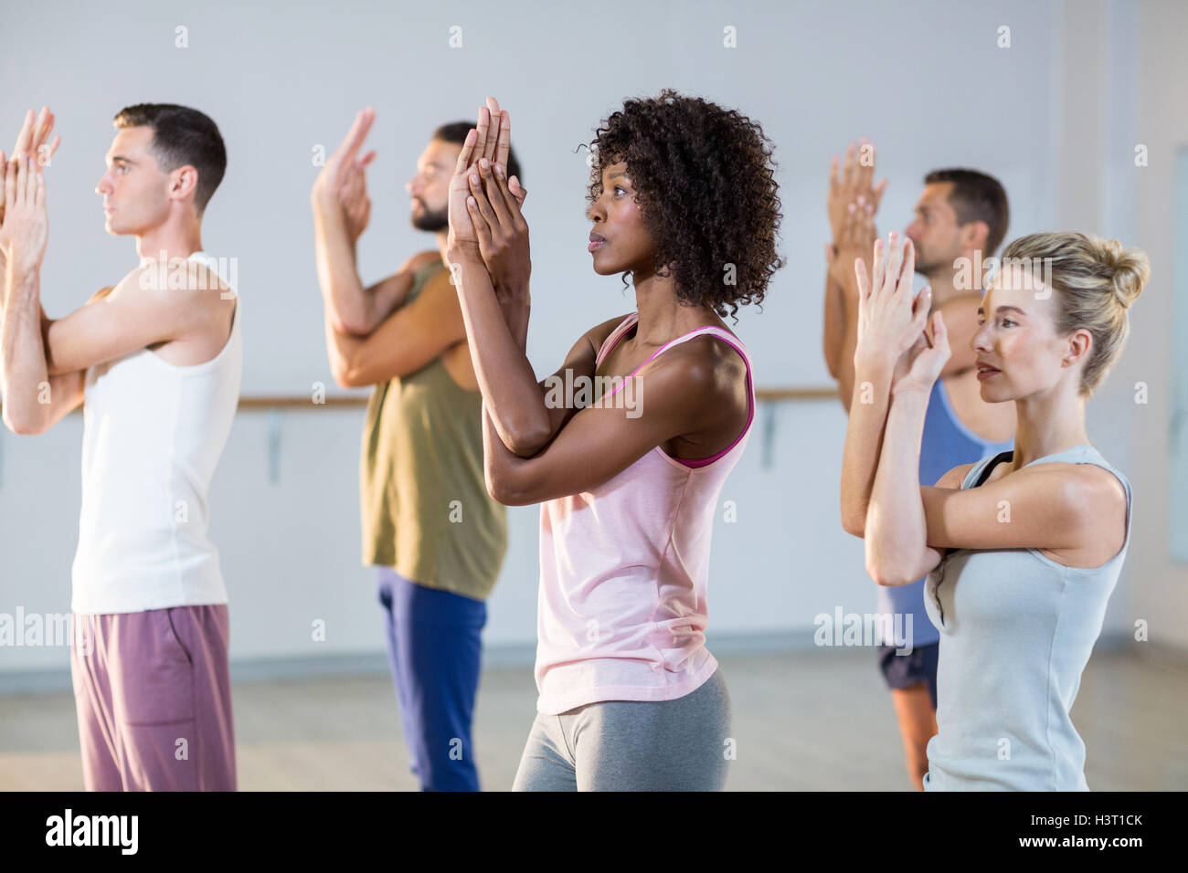 Group of people exercising Stock Photo - Alamy