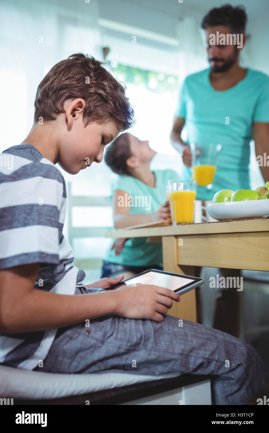 Child tablet table eating hi-res stock photography and images - Alamy