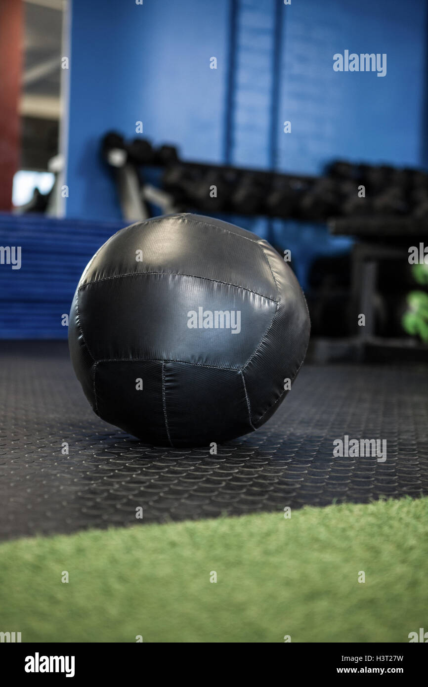 Black exercise ball in gym Stock Photo - Alamy
