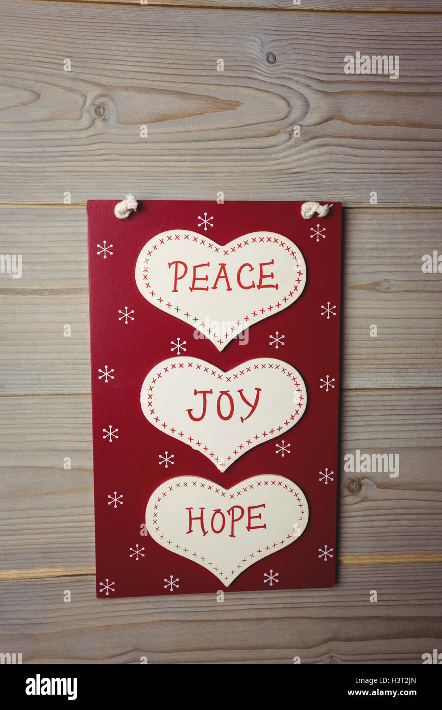 Christmas label with massages of peace, joy and hope Stock Photo - Alamy