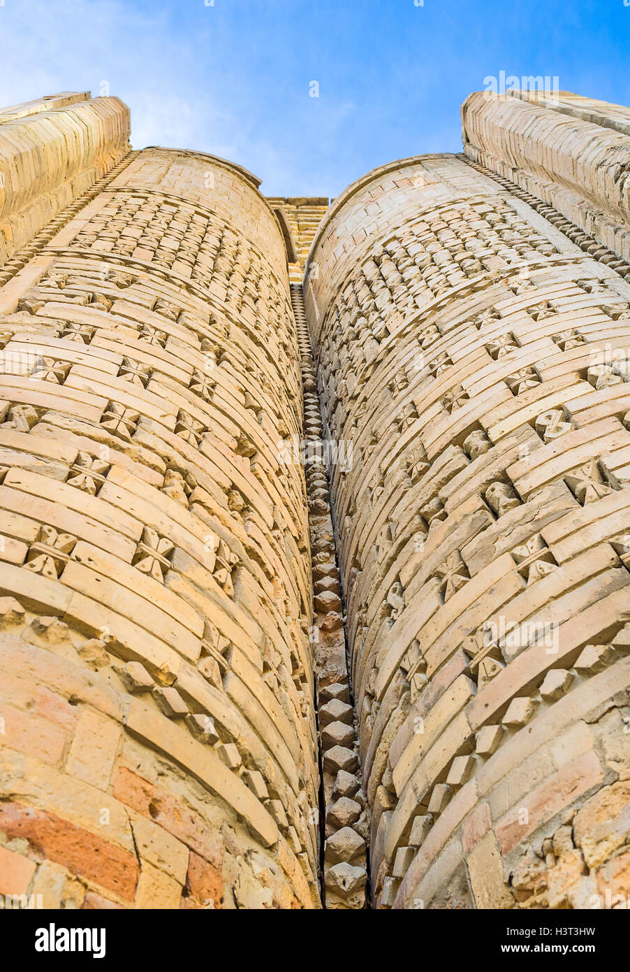 The relief brick walls with the interesting shaped details decorate the ...