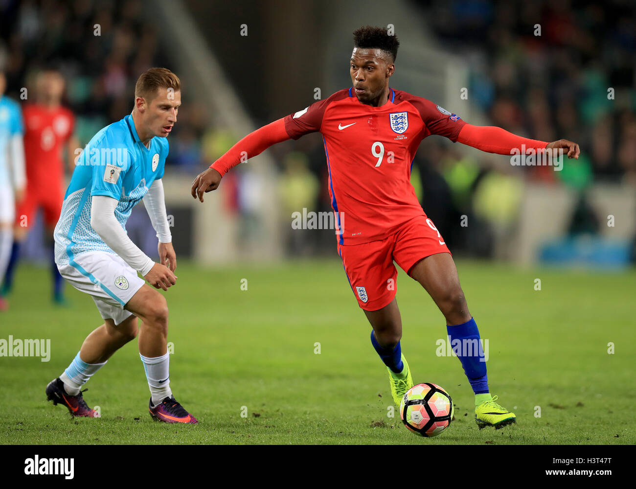 Slovenia's Valter Birsa (left) and England's Daniel Sturridge battle ...