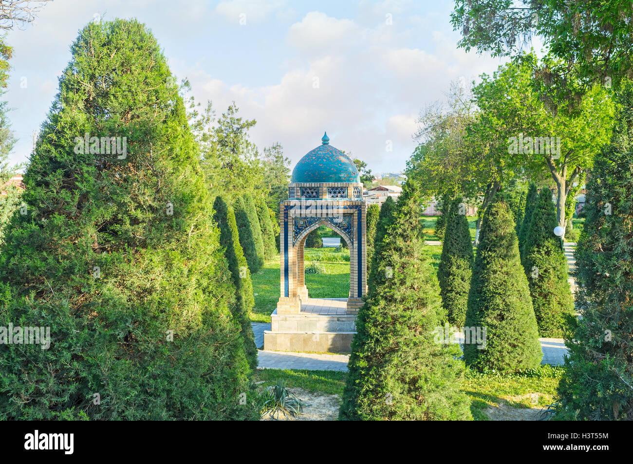The old alcove among the trees in garden of Mausoleum of Abu Mansur ...