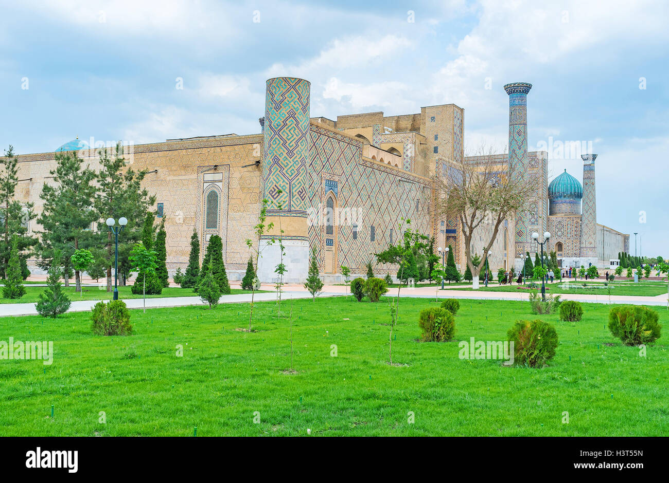 The Registan Square surrounded by the scenic green garden, Samarkand ...