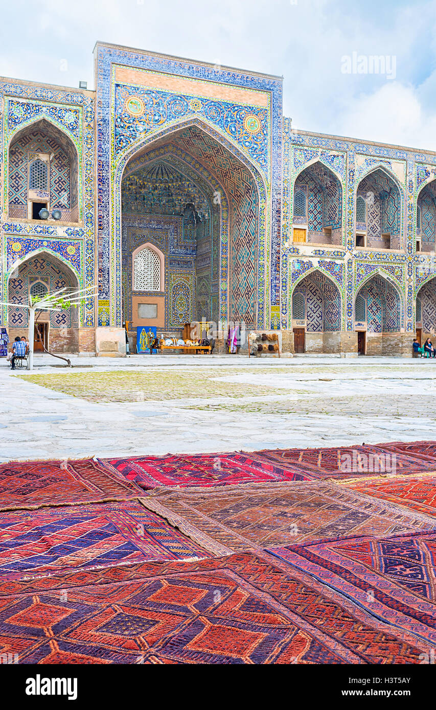 The rug stall located in the courtyard of the Sher-Dor Madrasah ...