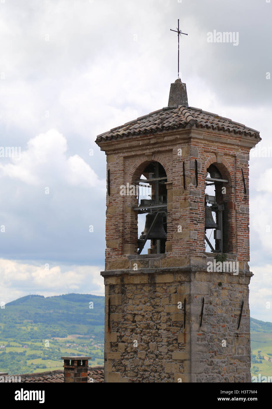 ancient bell tower masonry with bronze bells Stock Photo - Alamy