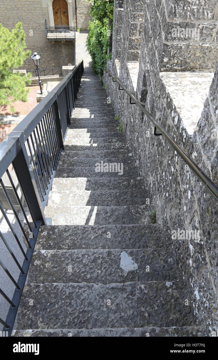 long staircase leading down from the tower of the medieval castle in ...