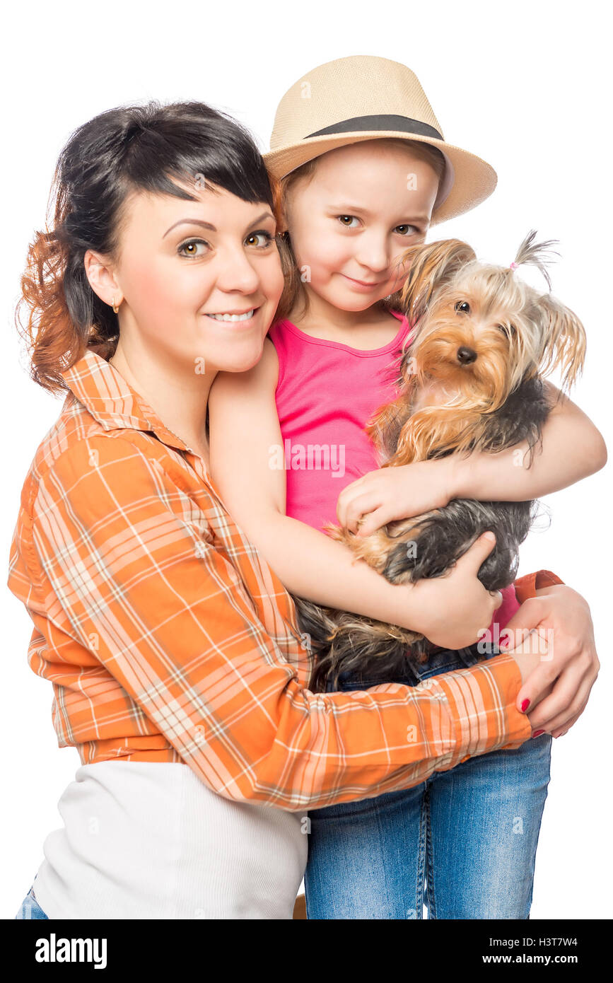 happy parent family and a puppy Yorkshire Terrier on a white background ...