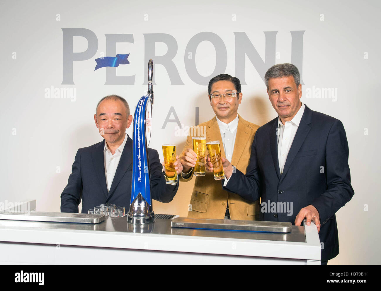 EDITORIAL USE ONLY (Left to right) Director of Asahi Group Holdings ...