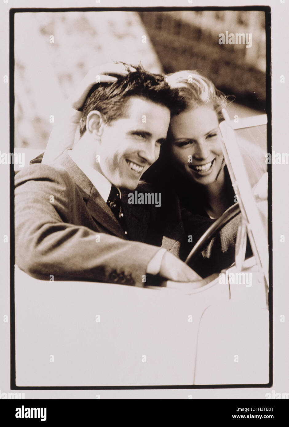 Couple, young, laugh, convertible, detail, b/w, cuttlefish, man, suit ...