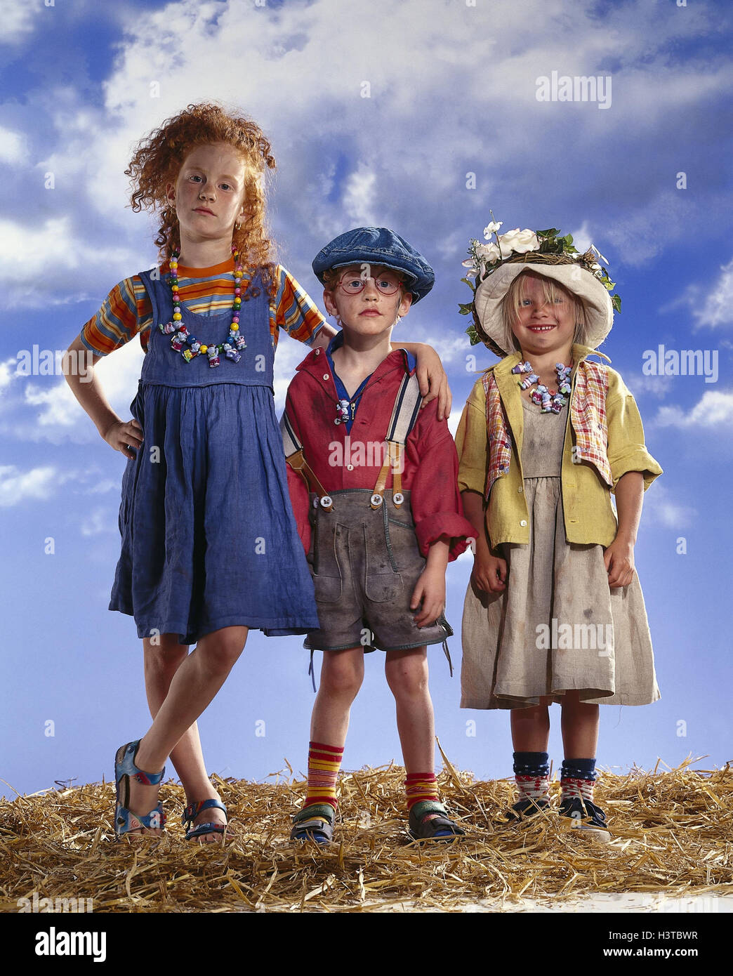 three children, straw, cloudy sky mb 57 A4 Stock Photo - Alamy