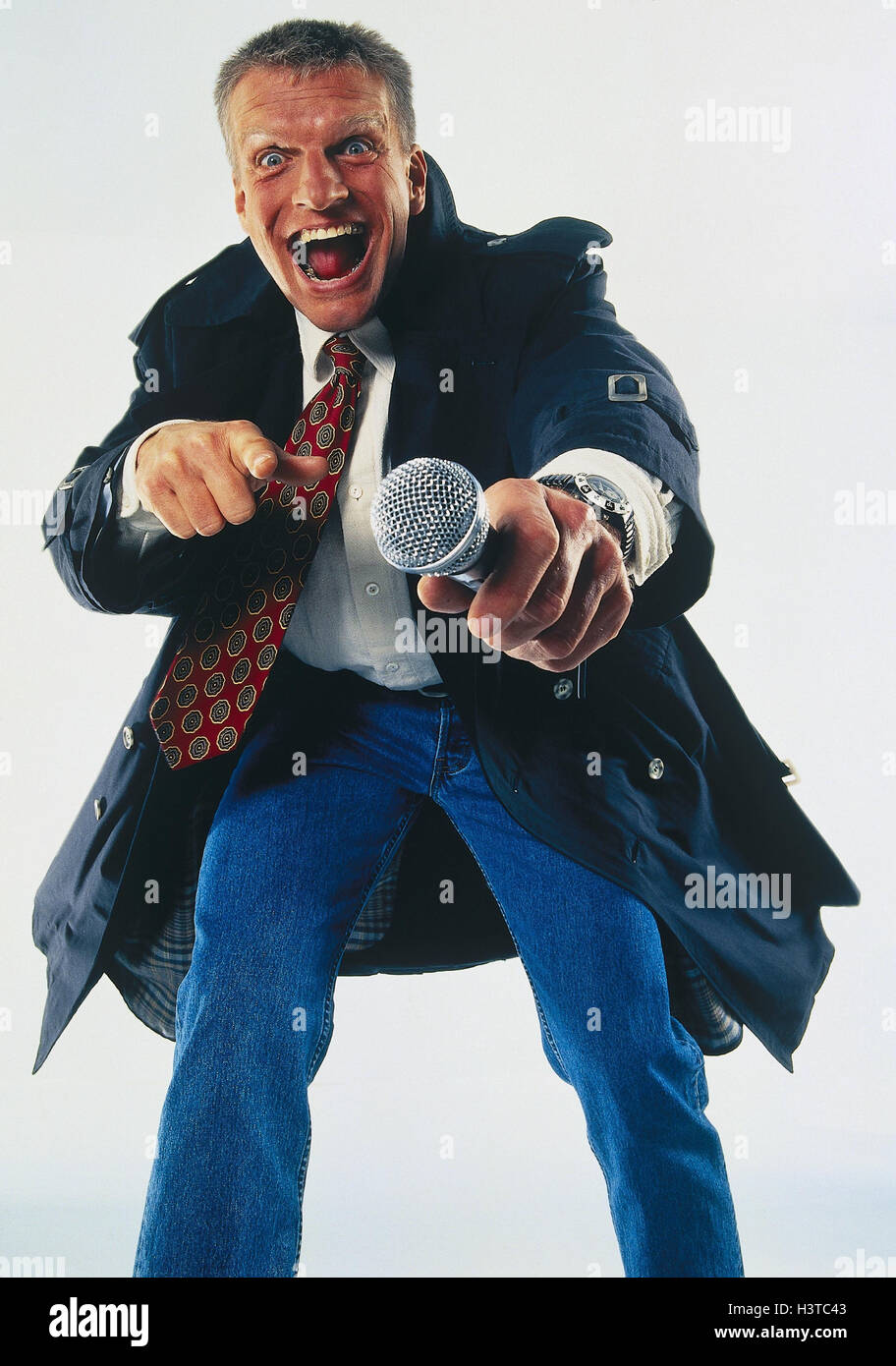 Man, microphone, reporter, gesture, studio Stock Photo - Alamy