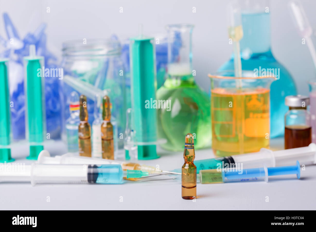 syringe with ampules of drugs Stock Photo - Alamy
