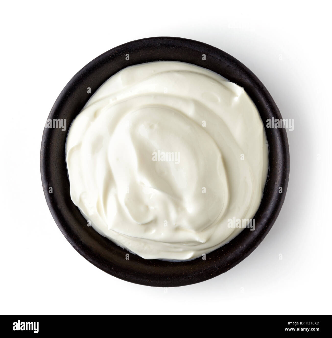 Black bowl of cream isolated on white background, top view Stock Photo ...