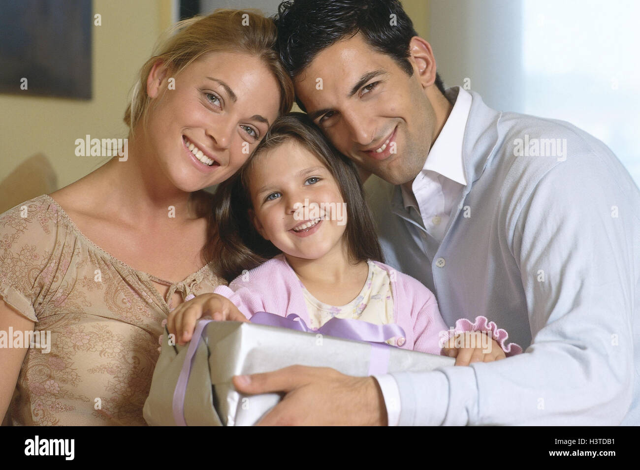 Parents, subsidiary, present, happy, portrait, model released, family ...