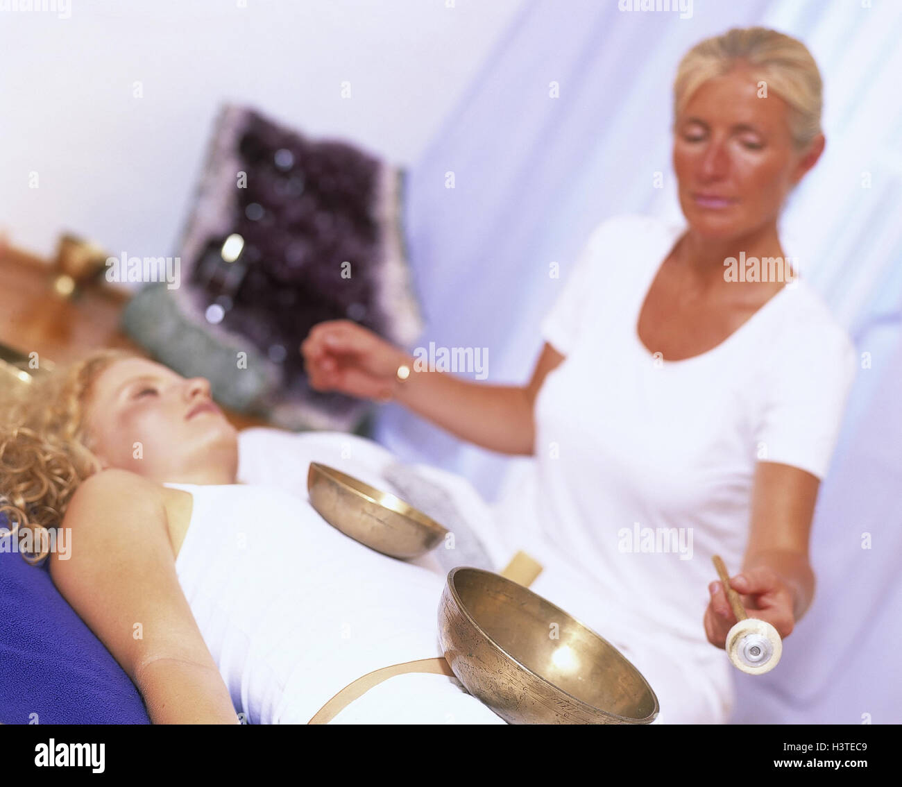 Alternative cure, woman, lie, massage remedial practical person, tonal ...